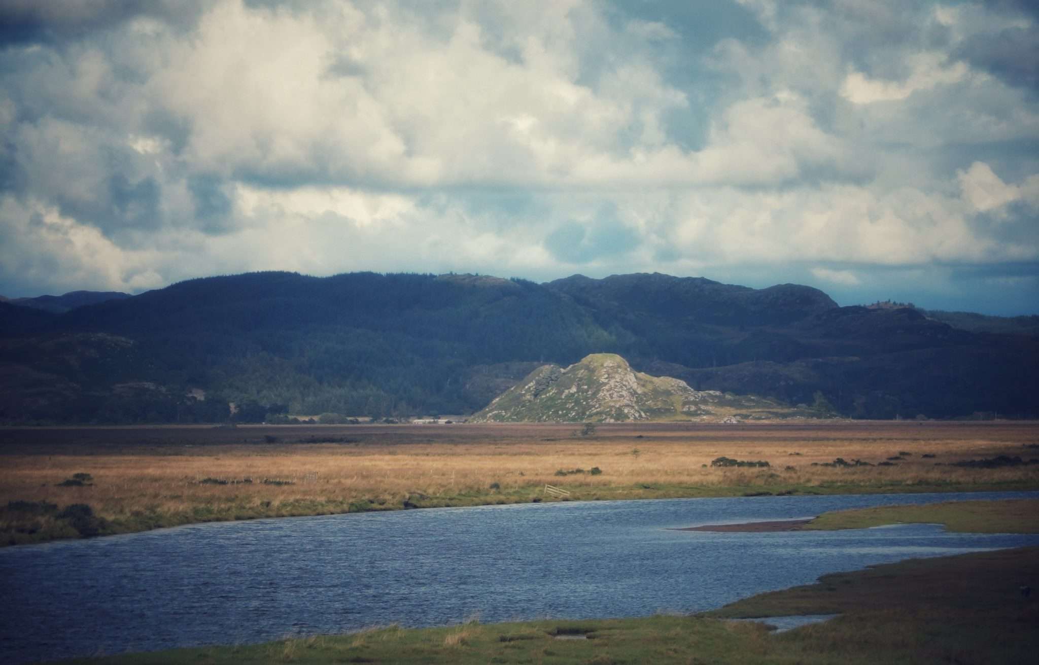 The hillfort of Dunadd seen across the Mhòine Mhór | The Scottish Banner